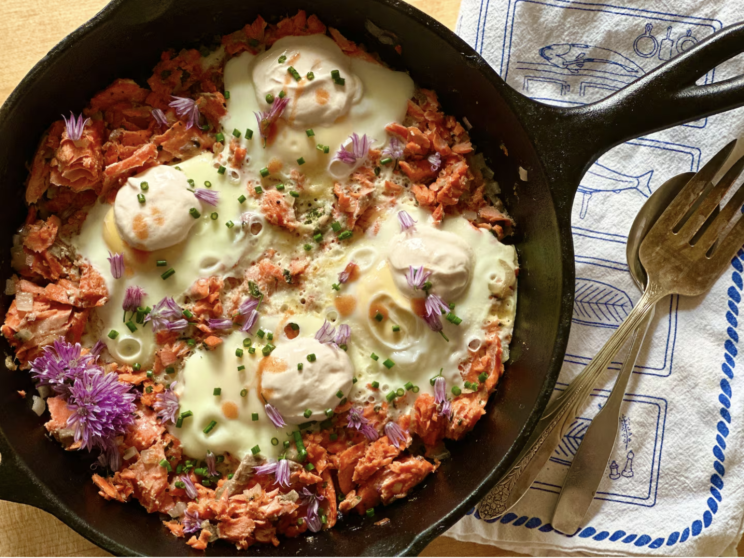 Turn last night’s salmon leftovers into savory hash and eggs with fresh ...